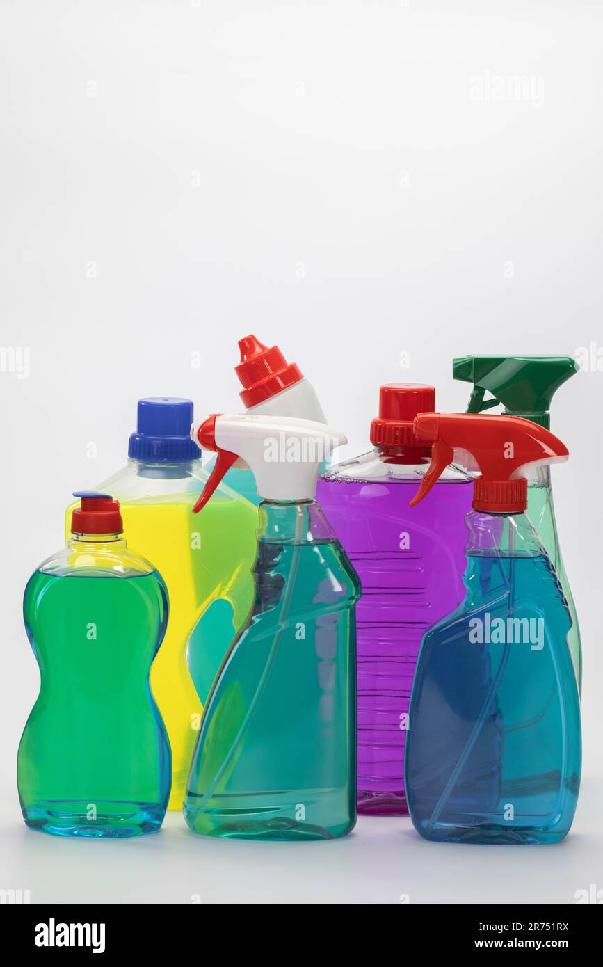Various household cleaning products, colorful, white background Stock ...