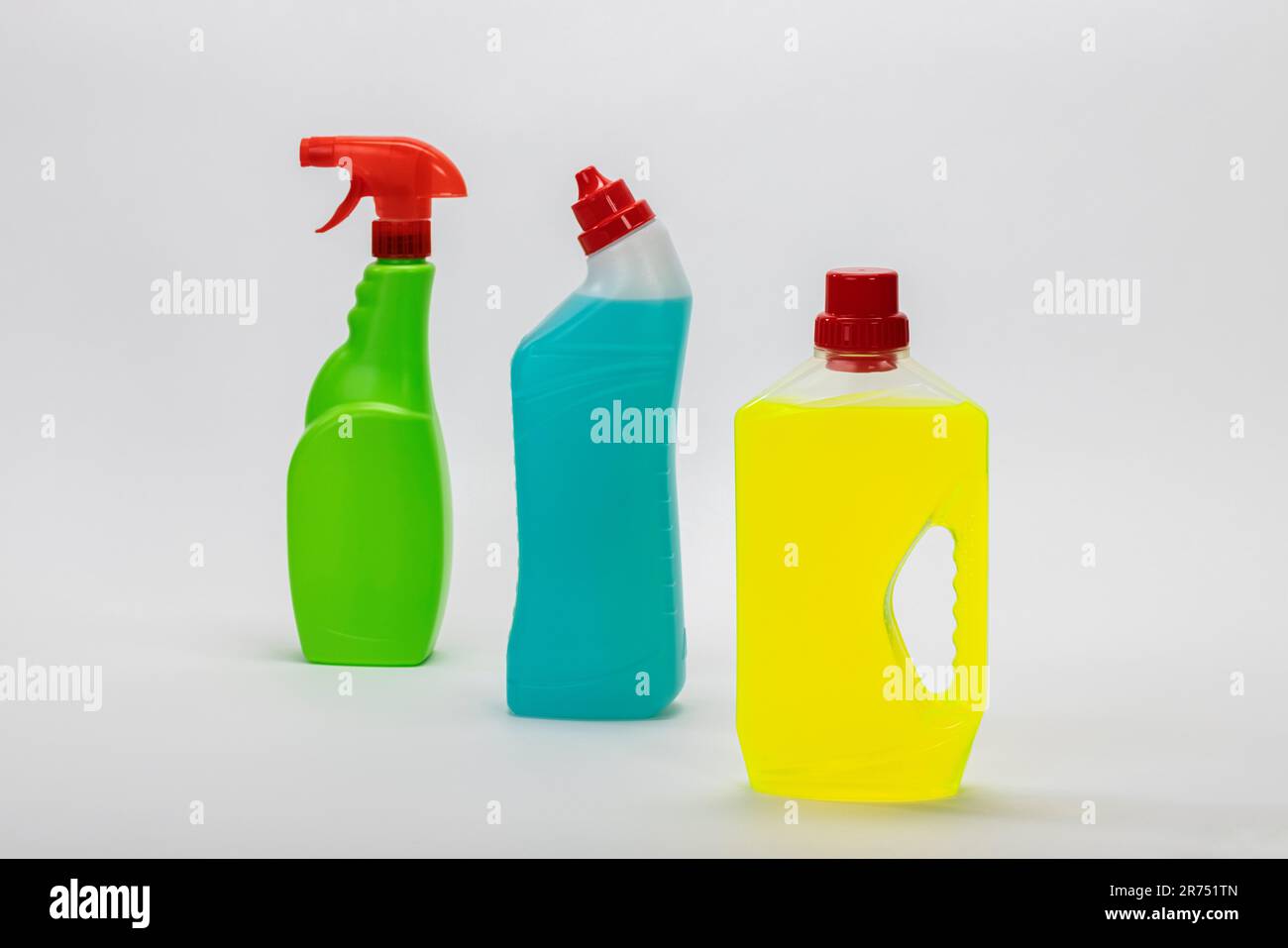 Various household cleaning products, colorful, white background Stock ...