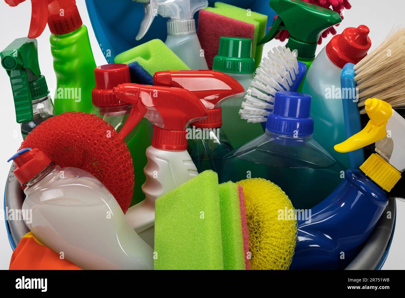 Cleaning bucket filled with cleaning utensils, detail, white background ...