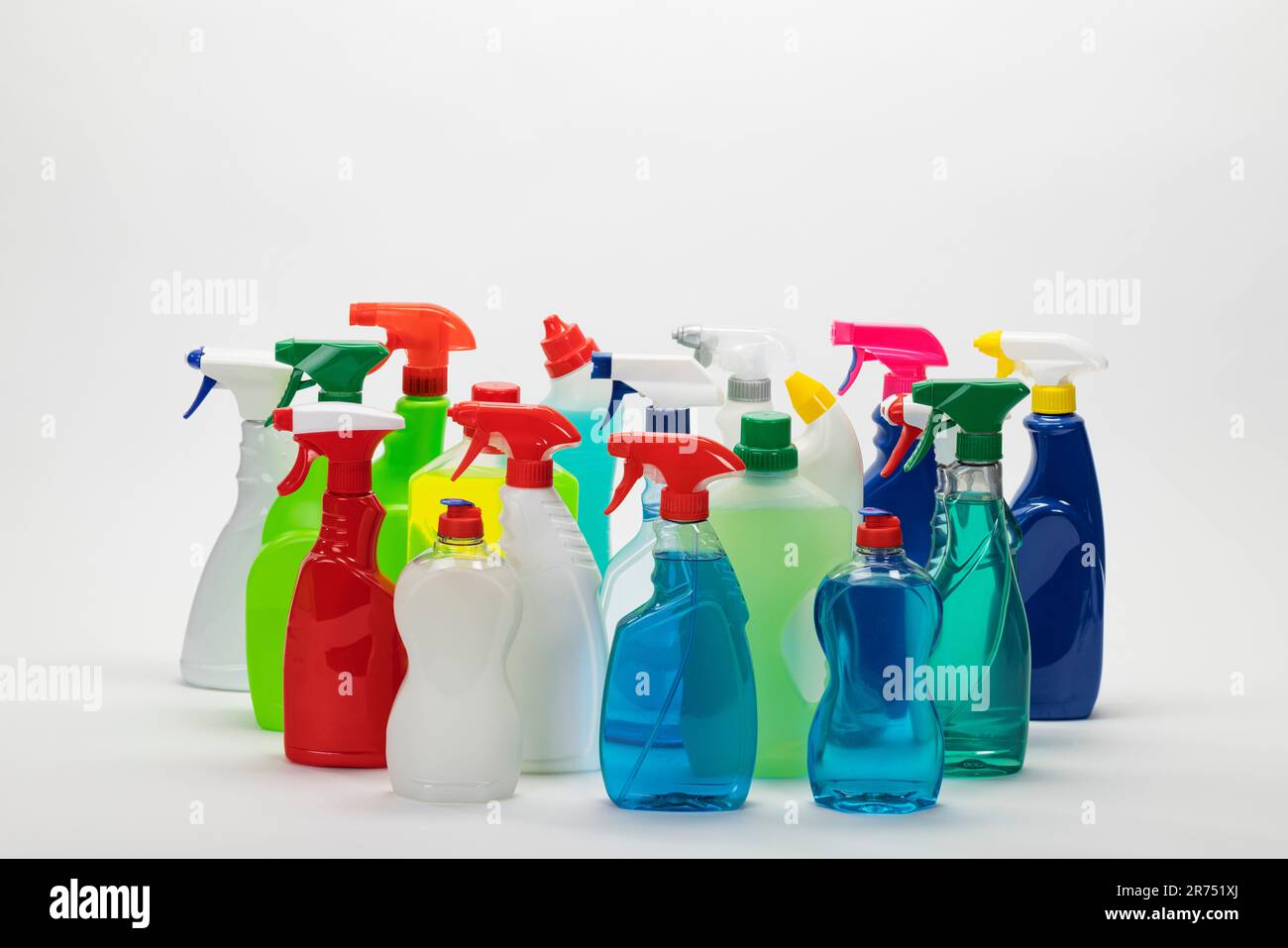 Various household cleaning products, colorful, white background Stock ...