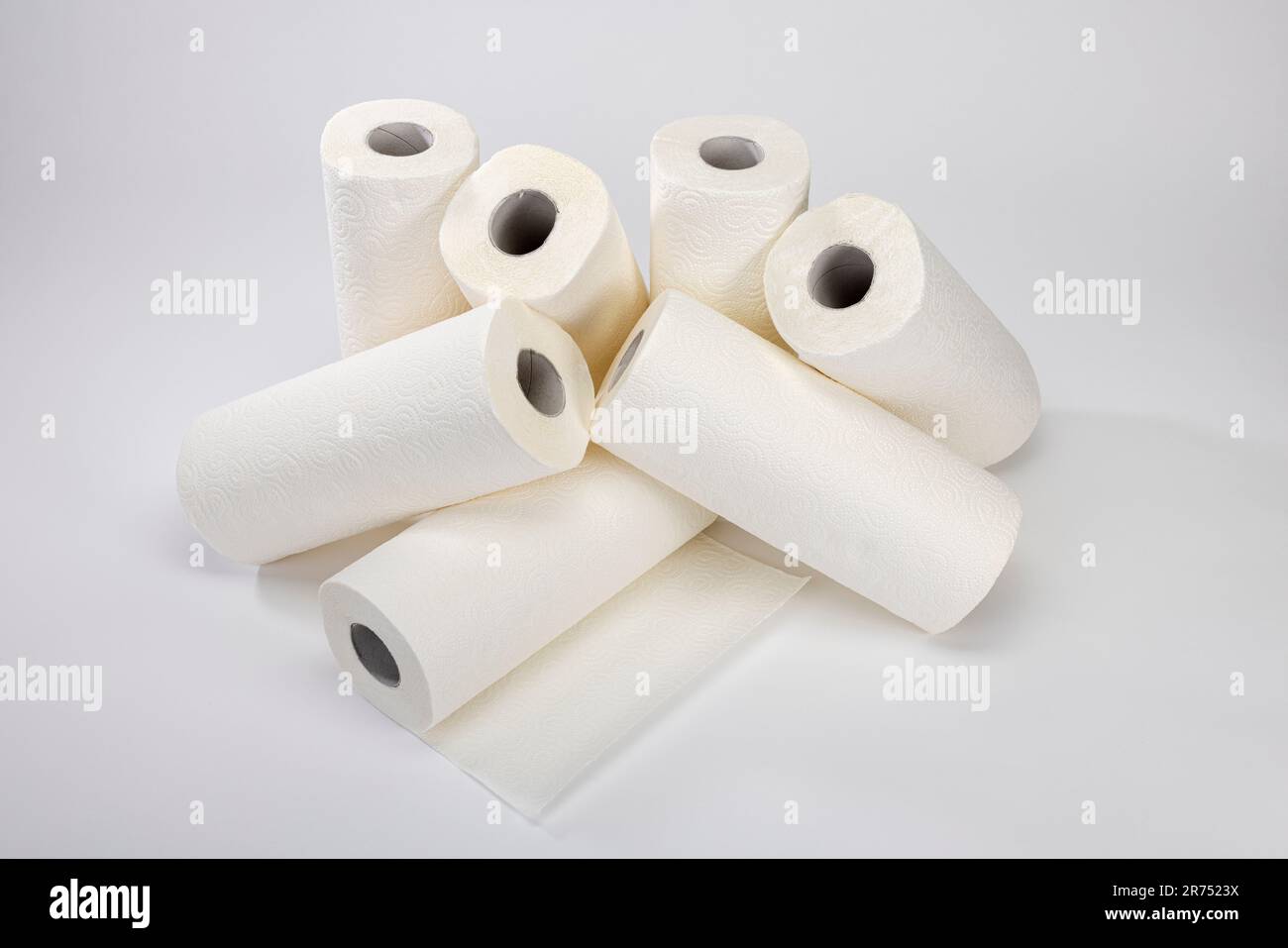 White kitchen rolls, white background Stock Photo - Alamy