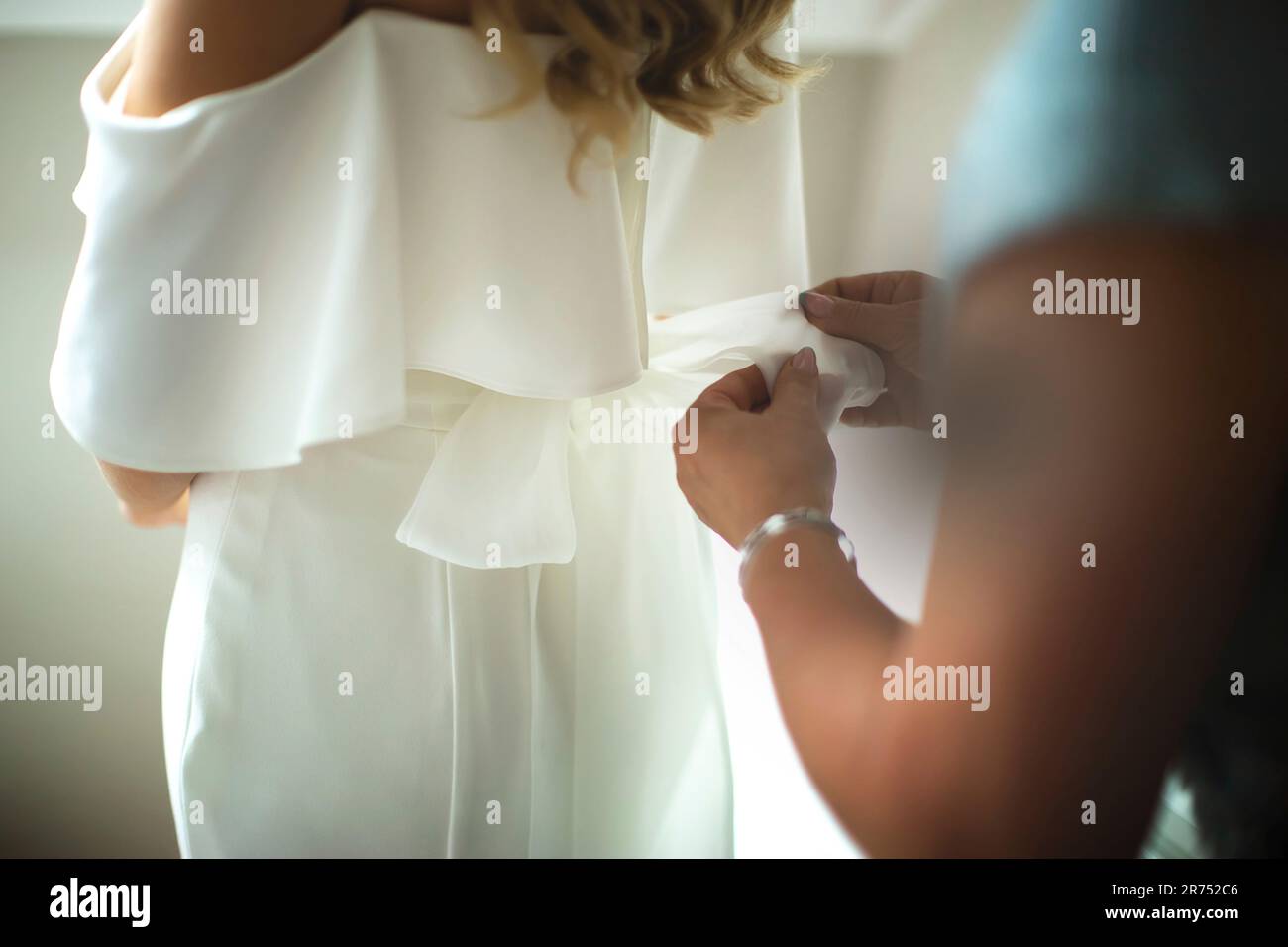 Dressing up for wedding hi-res stock photography and images - Alamy