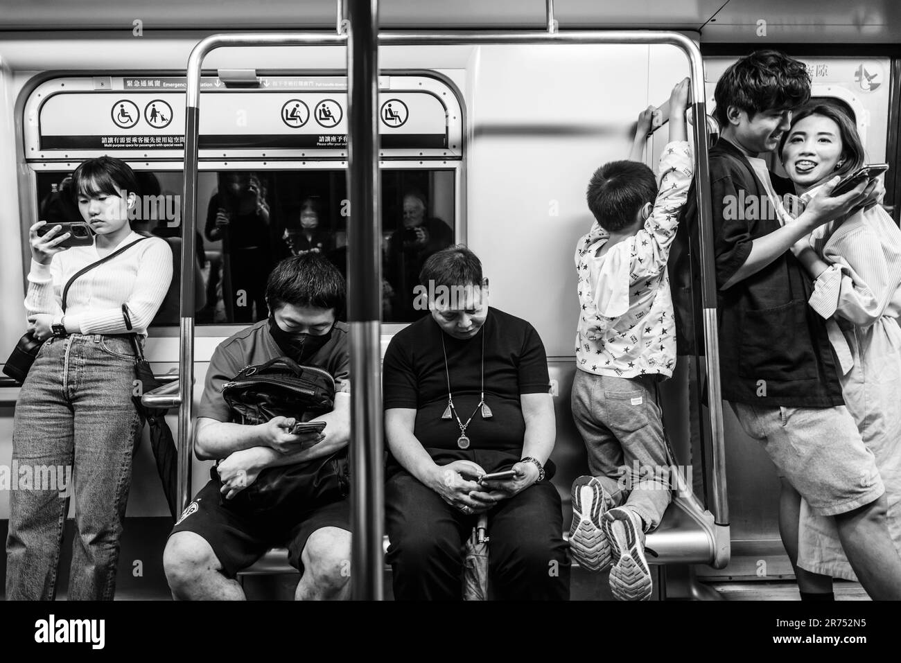 Passengers On A MTR Train, Hong Kong, China Stock Photo - Alamy