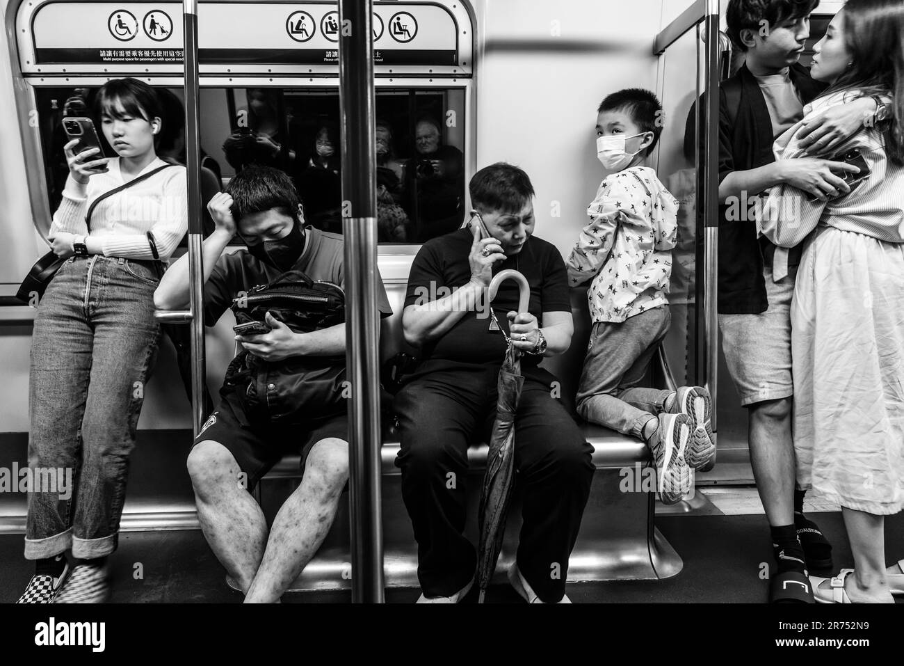 Passengers On A MTR Train, Hong Kong, China Stock Photo - Alamy