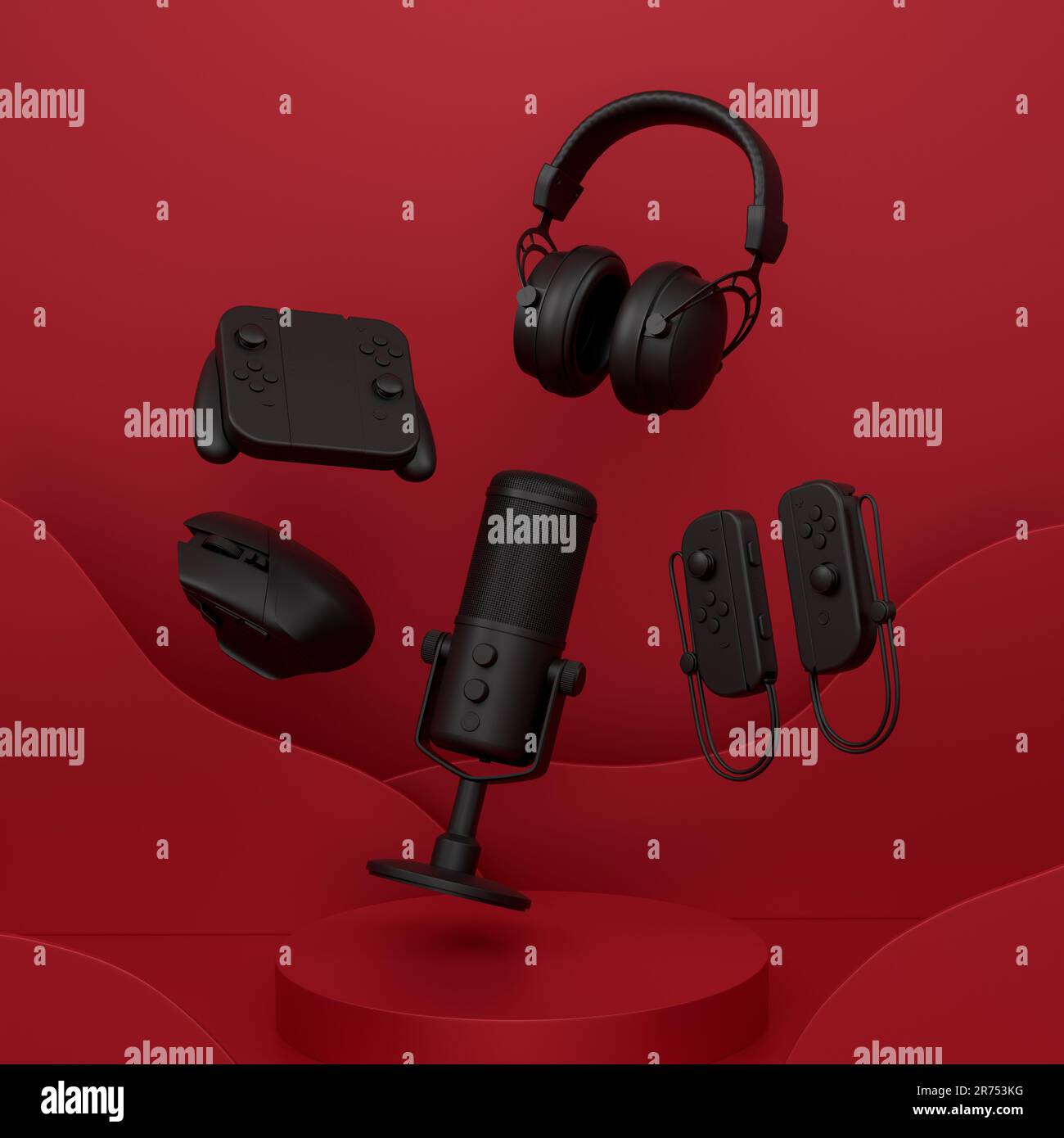 Set of video game joystick, microphone and headphones on cylinder ...