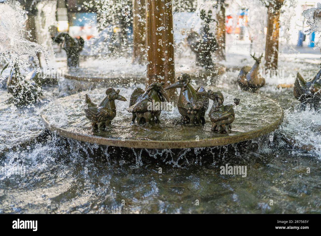 Water splashing over mythical bronze creatures in the (Elwetritschen ...