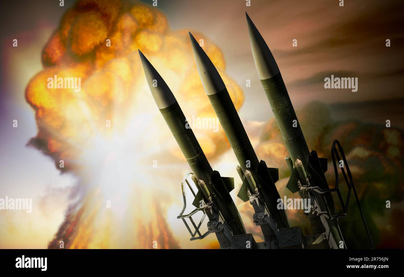 Warhead missiles and nuclear explosion mushroom cloud in background ...