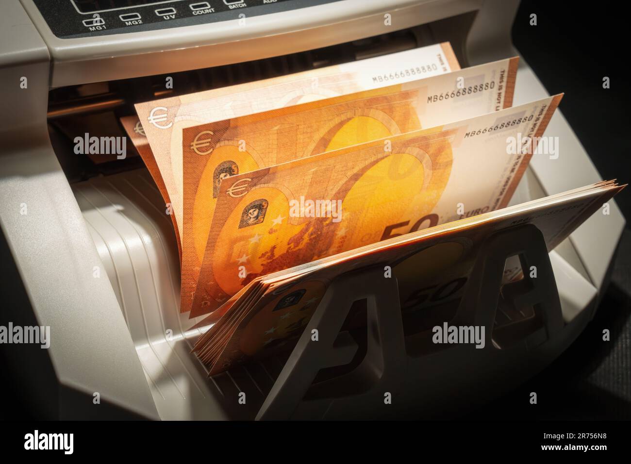 Bill money counting machine is counting EURO banknotes Stock Photo - Alamy