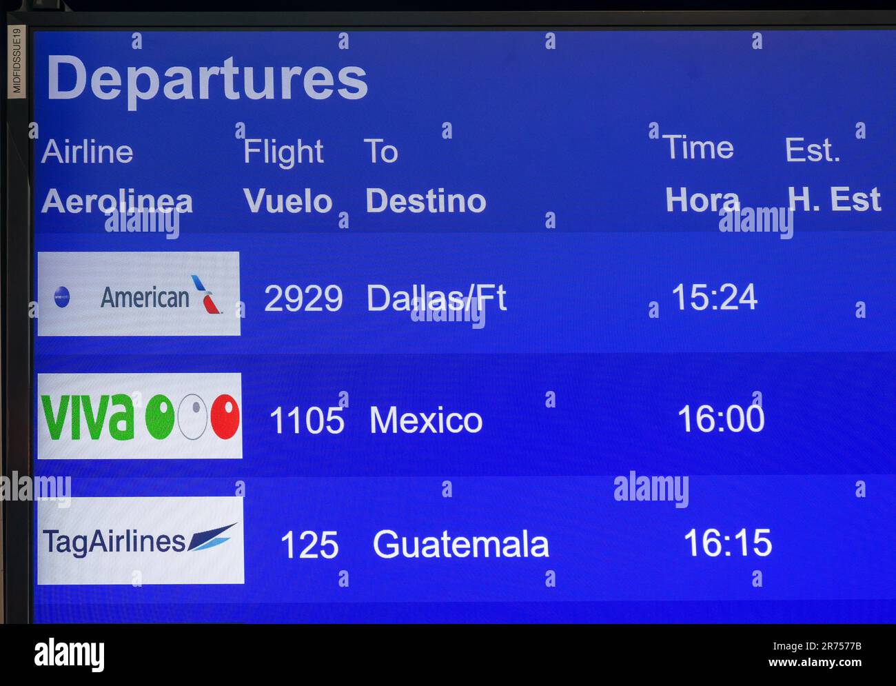 Electronic information display about flight departures, Merida airport ...