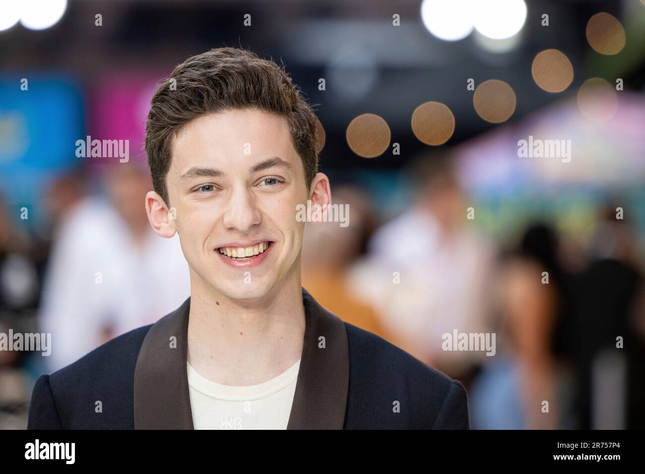 Andrew Barth Feldman poses for photographers upon arrival at the ...