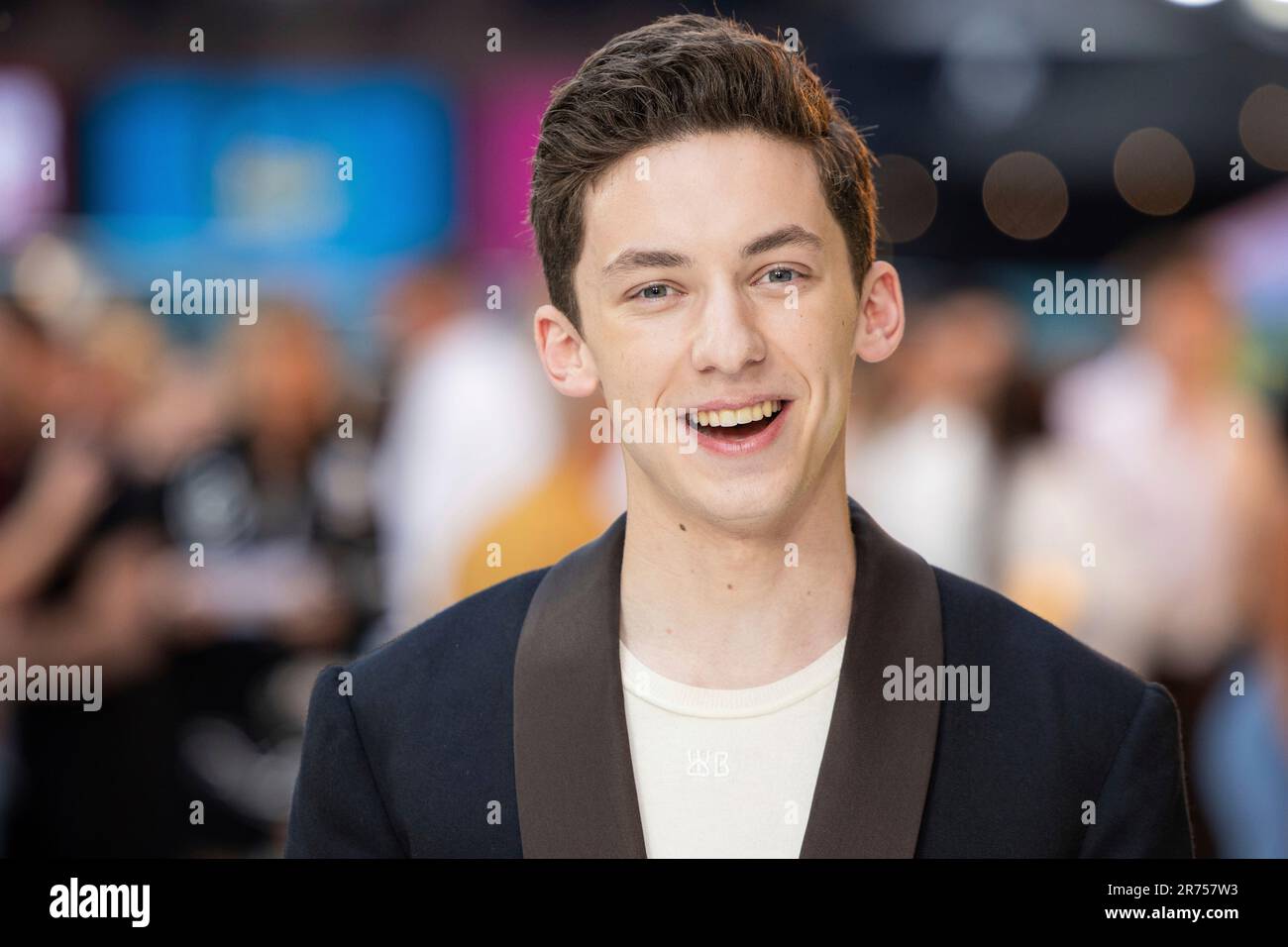 Andrew Barth Feldman poses for photographers upon arrival at the ...