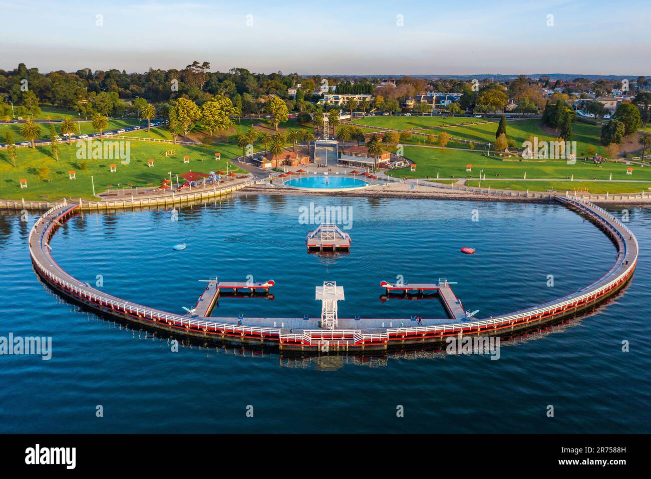 Aerial view of a circular swimming enclosure of parkland on the ...