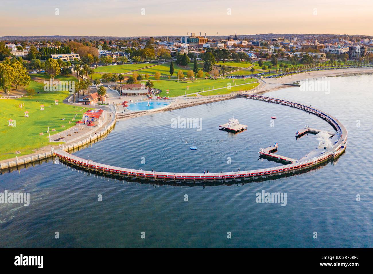 Aerial view of a circular swimming enclosure of parkland on the ...