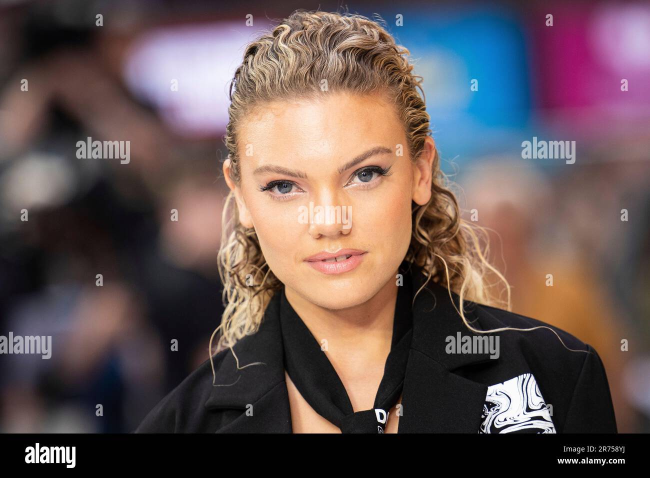 Becca Dudley poses for photographers upon arrival at the premiere of ...