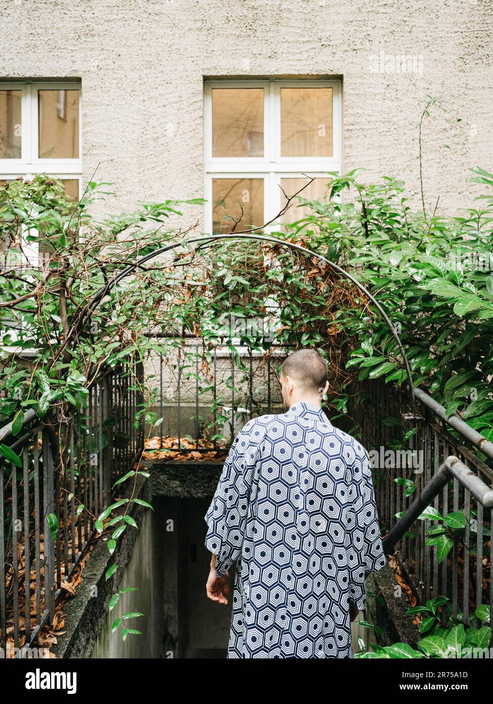 Standing man coat back hi-res stock photography and images - Alamy