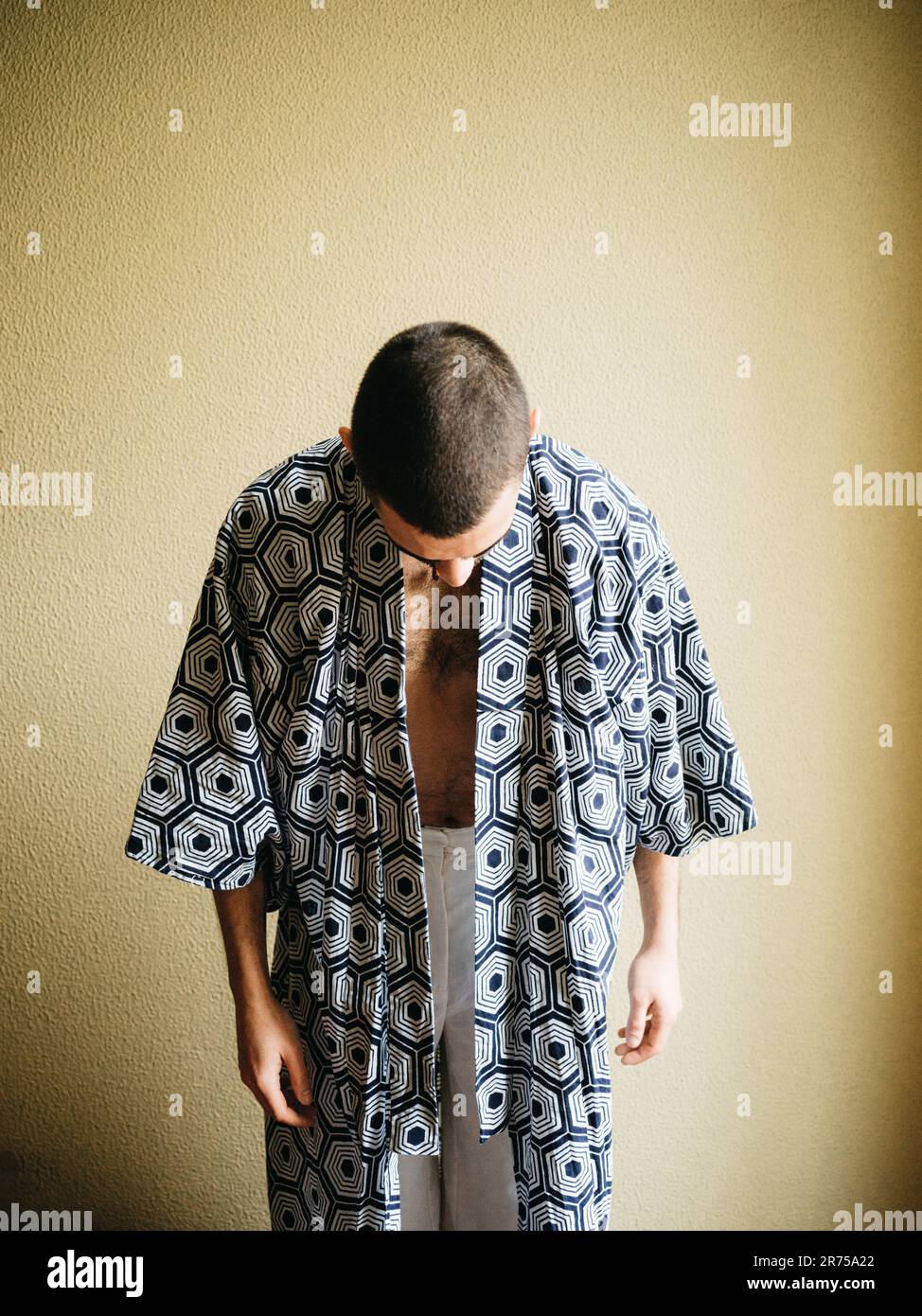 man, short haired, housecoat, posture bent over Stock Photo - Alamy