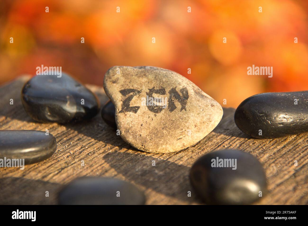 massage stones and a stone lettering ZEN Stock Photo - Alamy