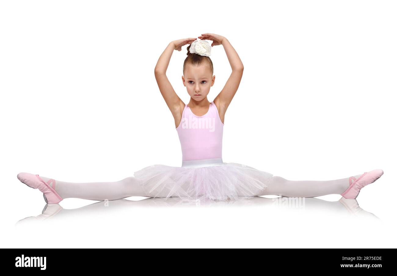 little ballerina sitting in tutu on floor on white background Stock ...