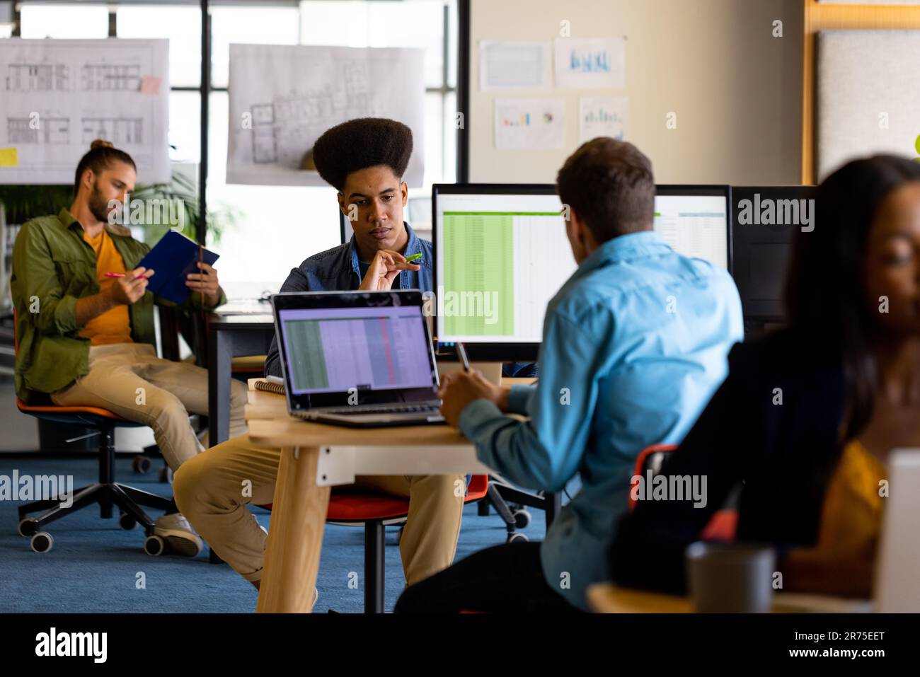 Diverse female creative colleagues in hi-res stock photography and ...