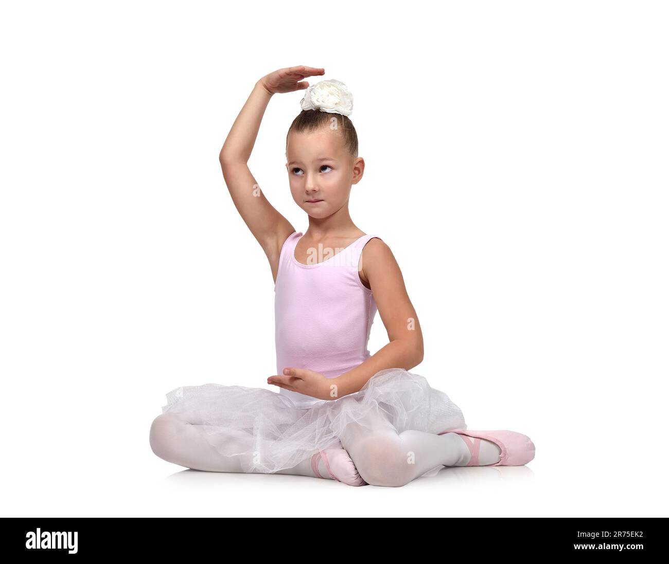 Ballerina children dancer sitting on floor in tutu Stock Photo - Alamy