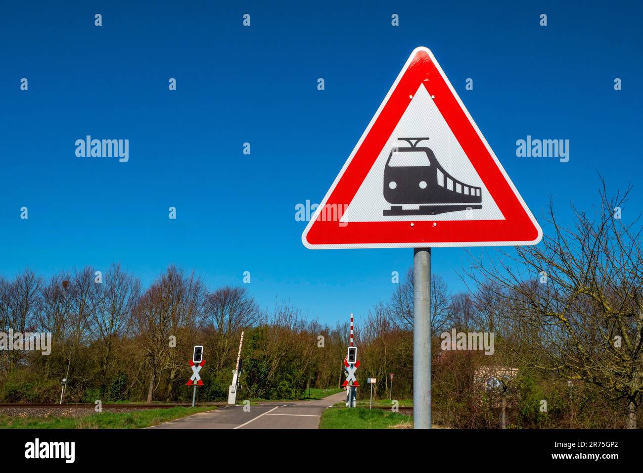 Barriered level crossing, Neuss, North Rhine-Westphalia, Germany Stock ...
