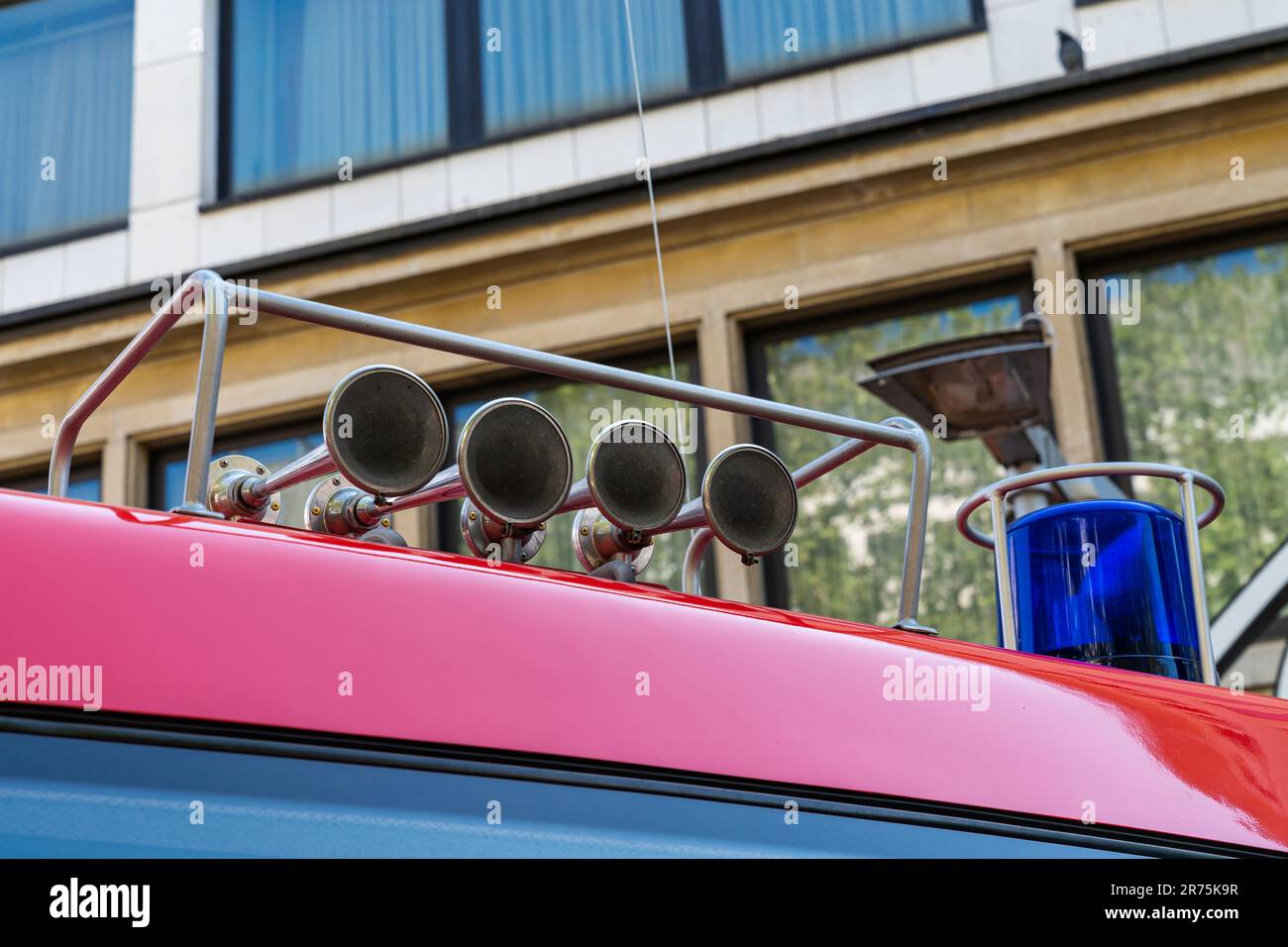 Flashing blue signal and four vintage signal horns on the fire truck ...