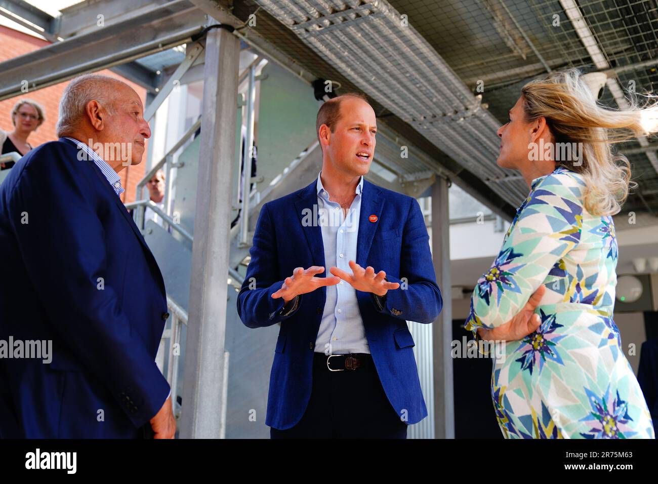 The Prince of Wales (centre) attends the opening of Centrepoint's ...