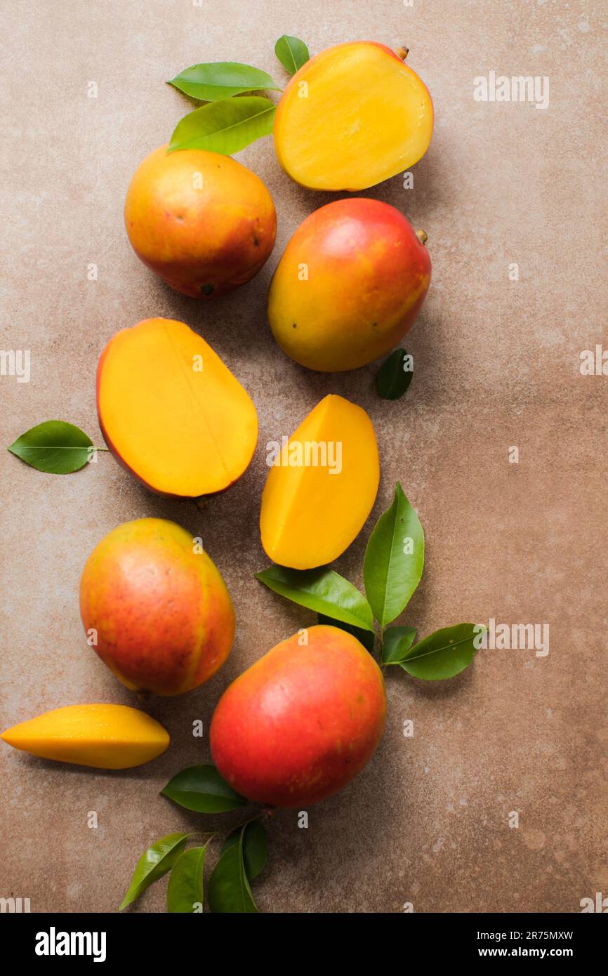 Mango background design concept. Top view of fresh mango fruit pattern ...