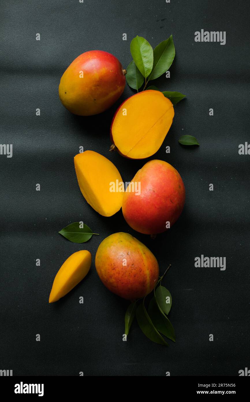 Mango background design concept. Top view of fresh mango fruit pattern ...
