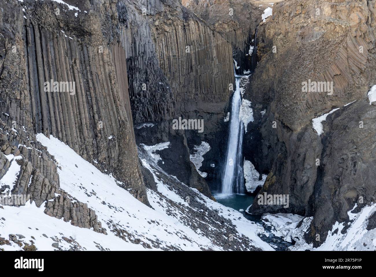 Litlanesfoss with its basalt columns in winter Stock Photo - Alamy