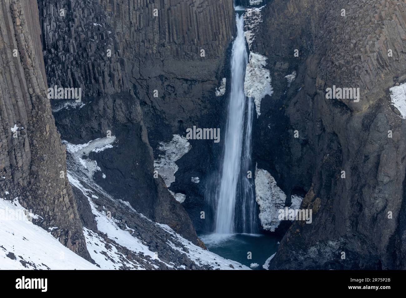 Litlanesfoss with its basalt columns in winter Stock Photo - Alamy