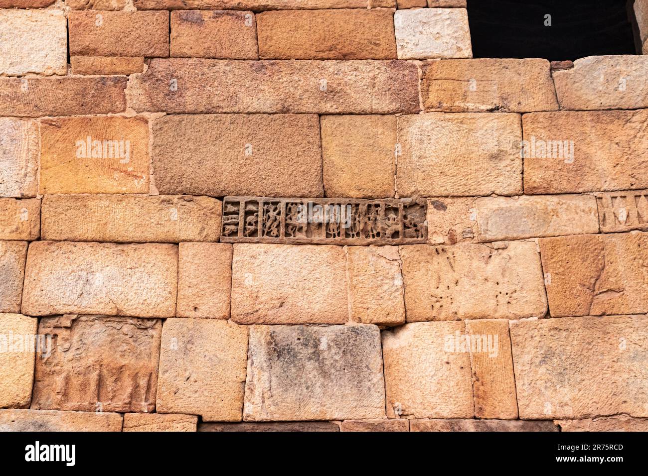 The wall of Quwwat-ul-Islam Mosque in Qutb Minar complex. Delhi, India ...