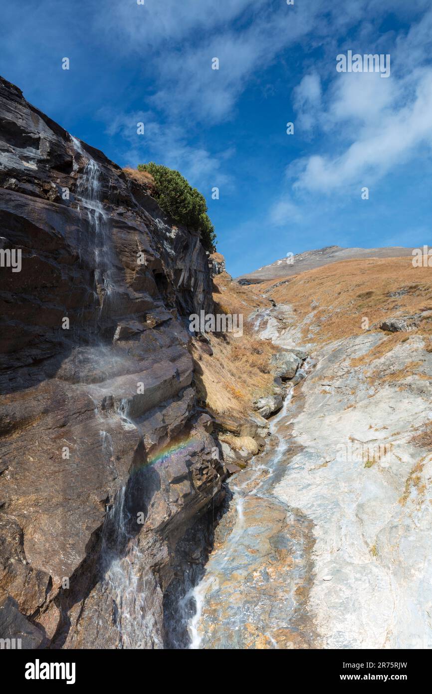 Fensterbach waterfall with rainbow, Grossglockner High Alpine Road ...
