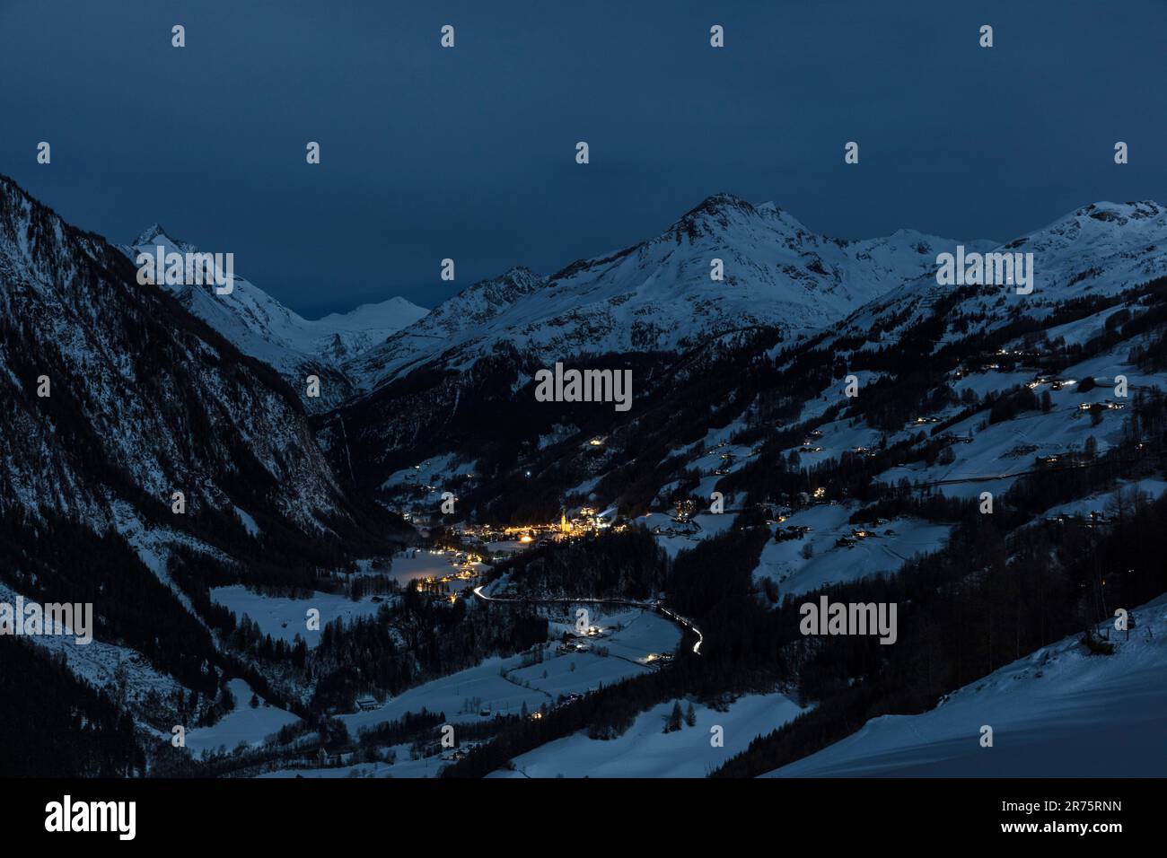 Heiligenblut on Großglockner in winter, night, illuminated, snow Stock ...