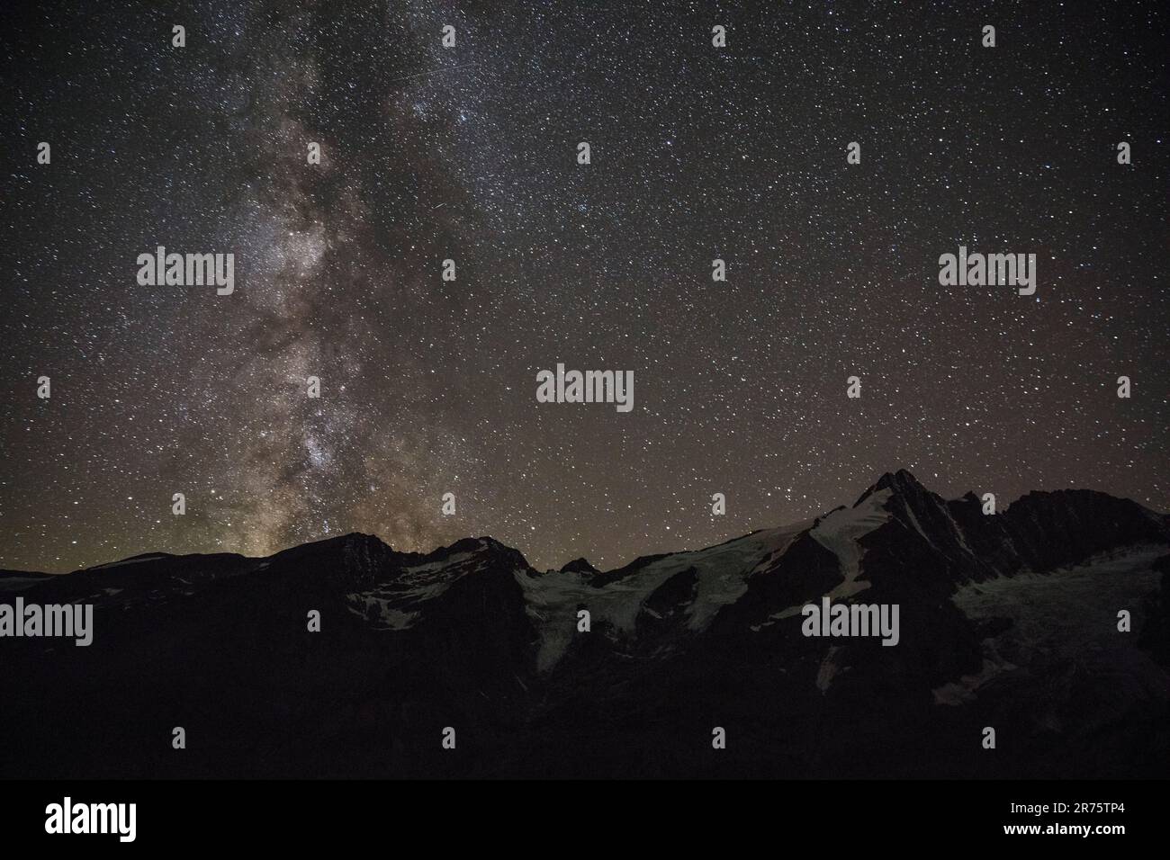 Milky Way, galactic center next to Großglockner and snow covered ...
