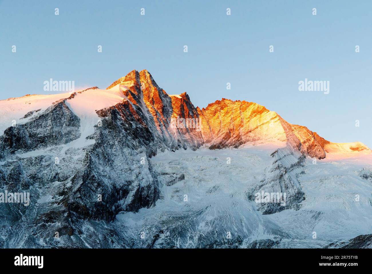 Großglockner summit at sunrise, alpenglow Stock Photo - Alamy