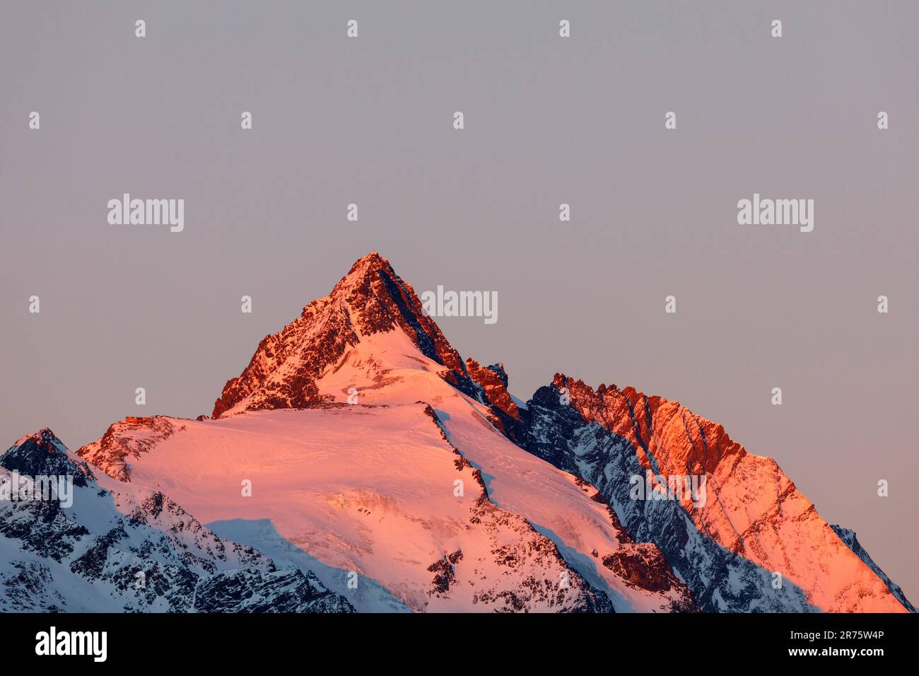 Sunrise on Großglockner, Glockner summit, alpenglow Stock Photo - Alamy