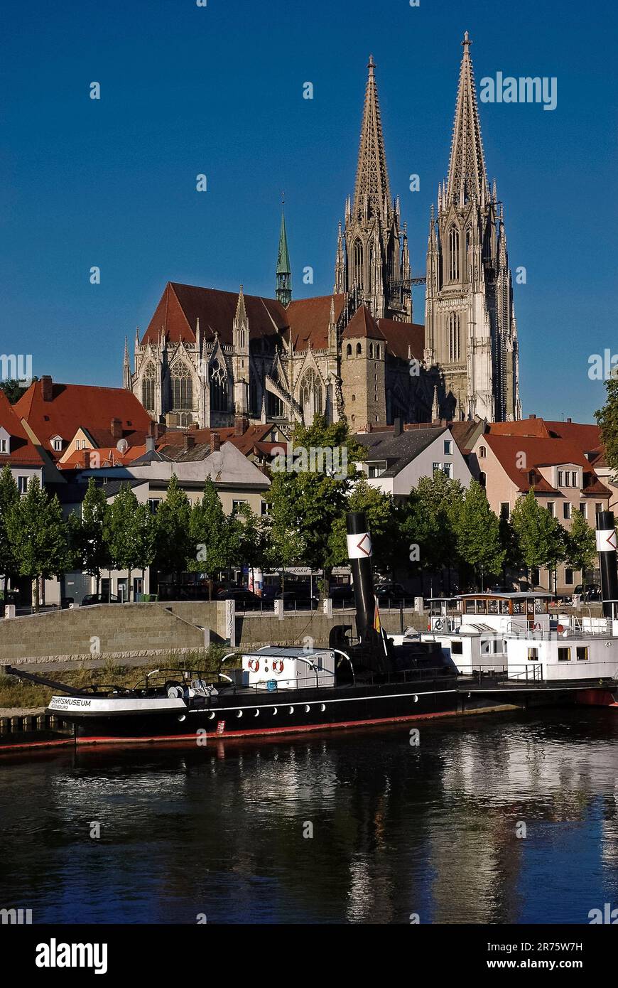 Soaring above the River Danube at Regensburg in Germany, two neo-Gothic ...