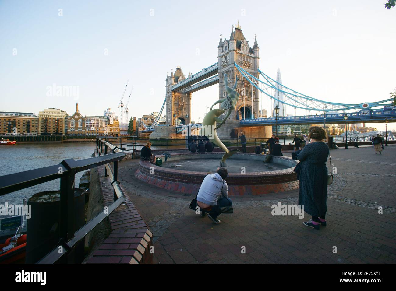 Photographer taking a picture of Girl With A Dolphin Fountain (1973) by ...