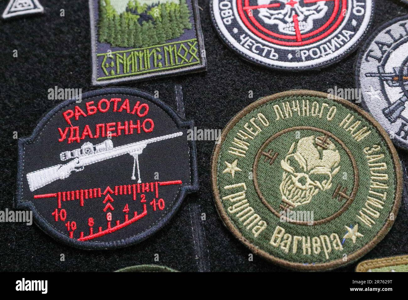 09.06.2023. Russia. Moscow. Patches on clothes in the store of tactical ...