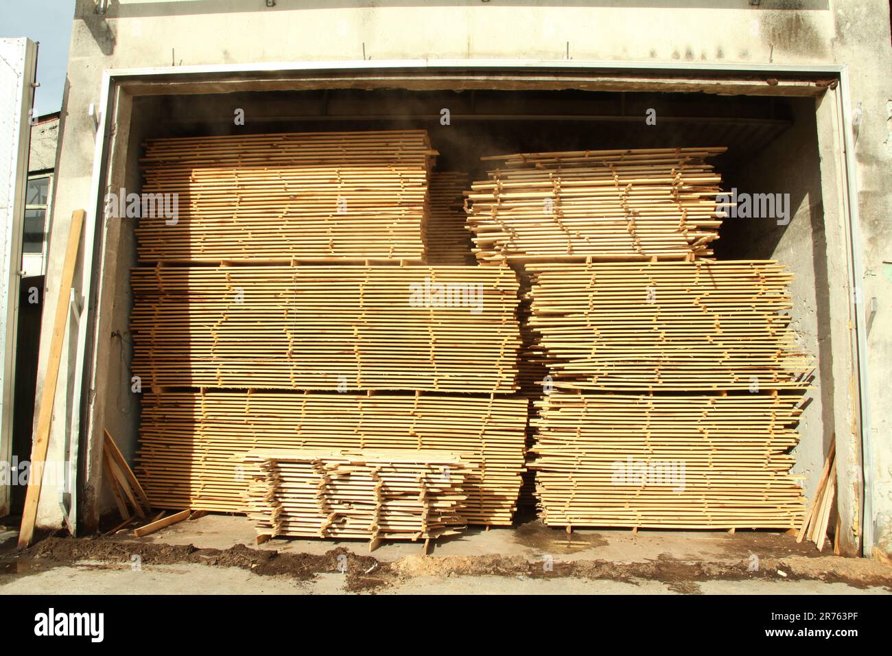 Wood timber construction material. Pile of construction timber at the ...