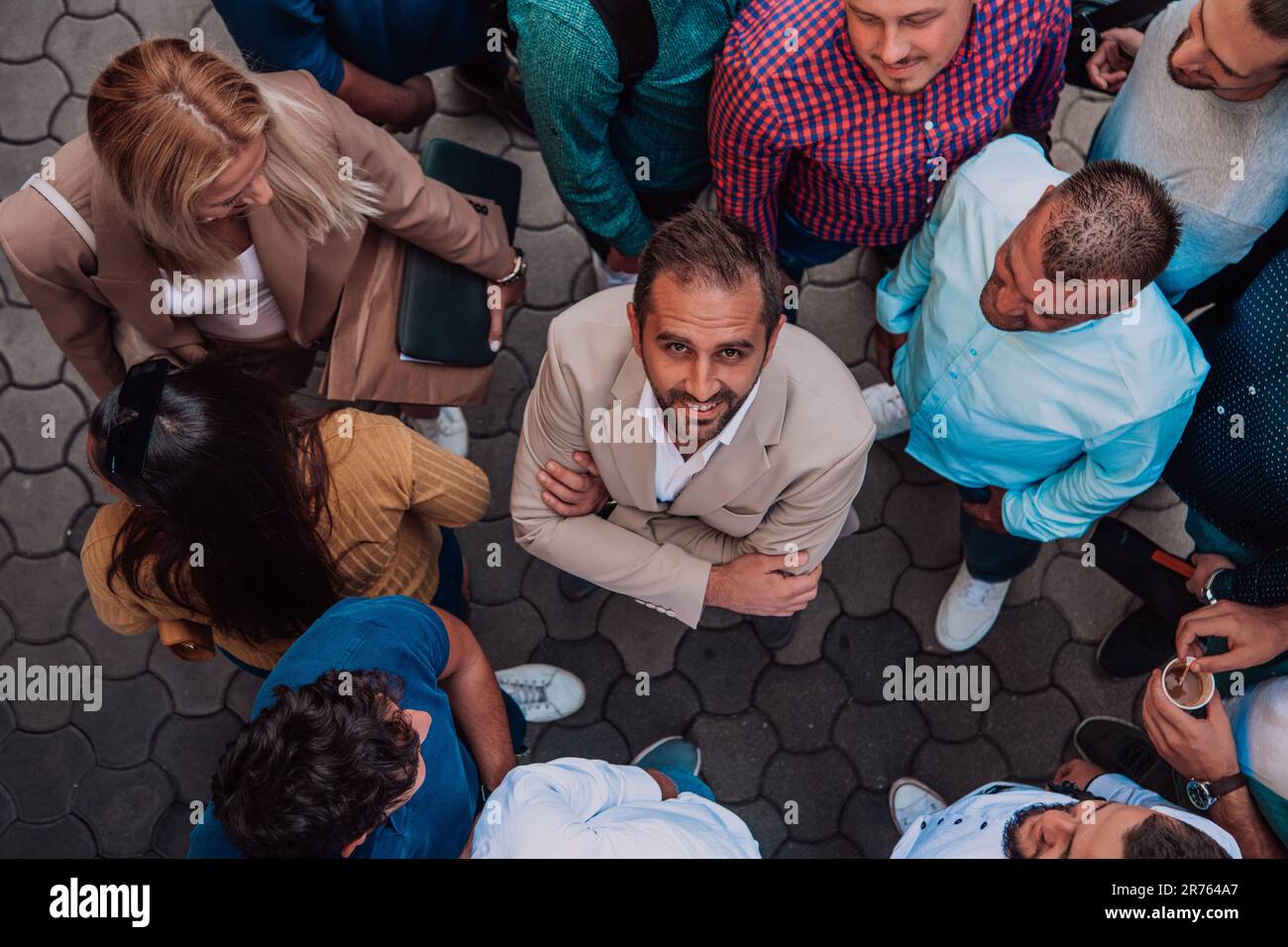 A top view photo of group of businessmen and colleagues standing ...