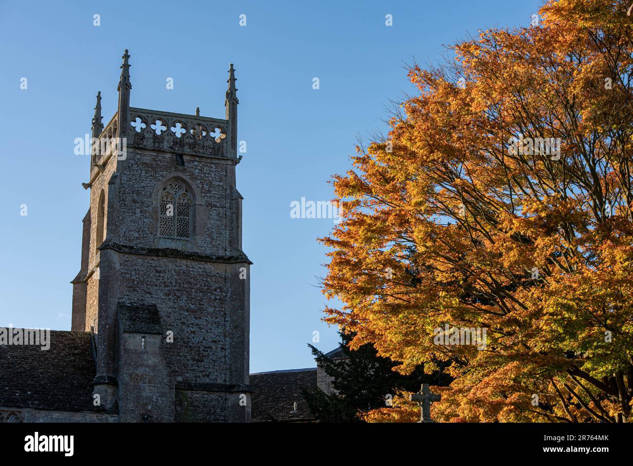 Traditional English Church with Autumn leaves Stock Photo - Alamy