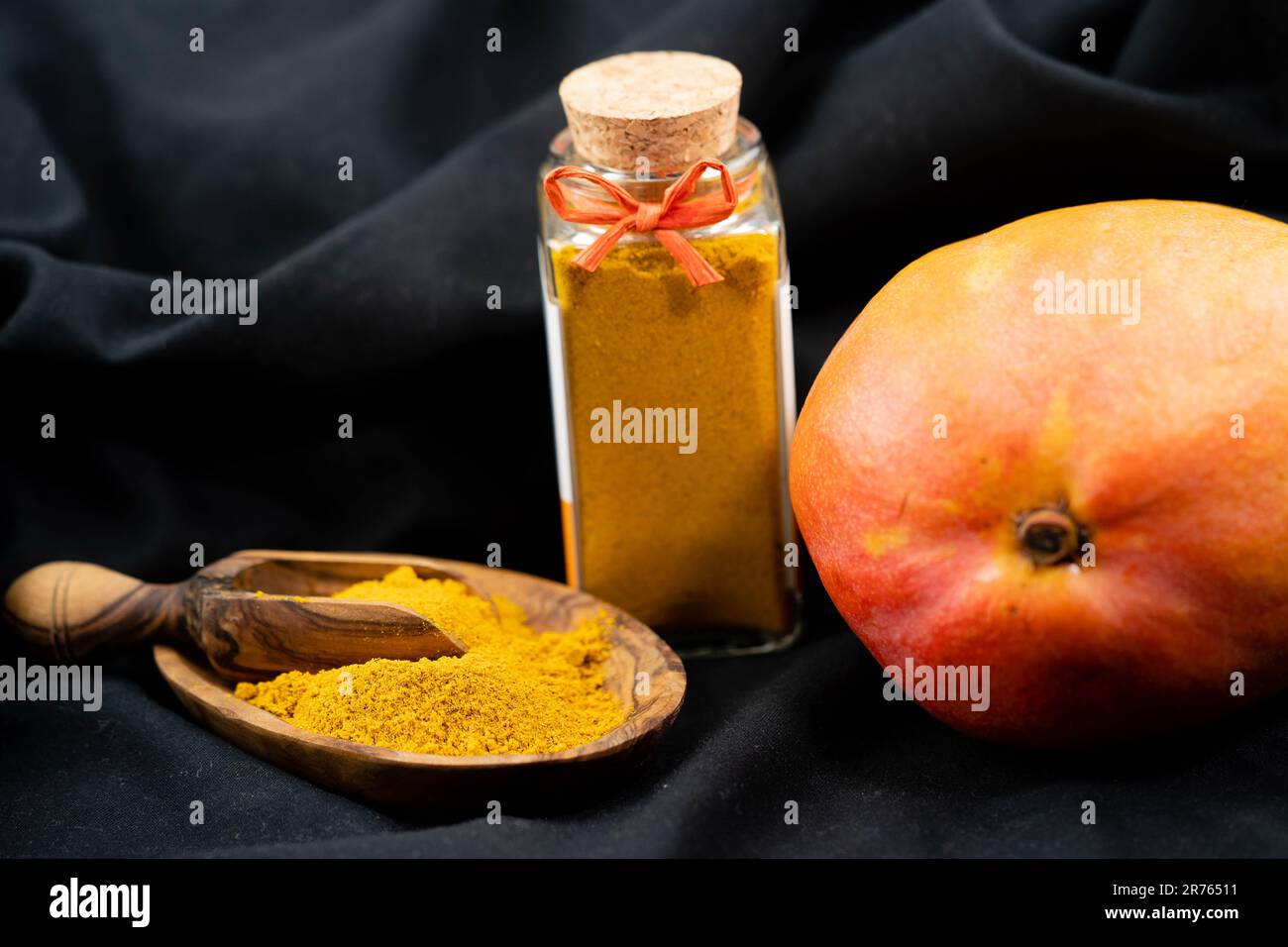 Turmeric Curcuma longa curry mix with mango powder Stock Photo - Alamy