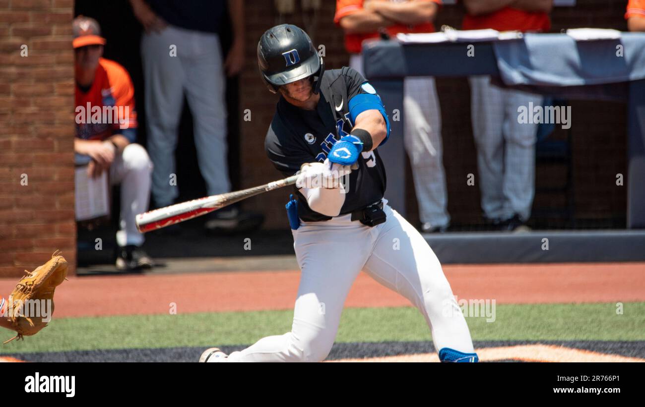 Duke outfielder Damon Lux (9) swings at a pitch during an NCAA baseball ...