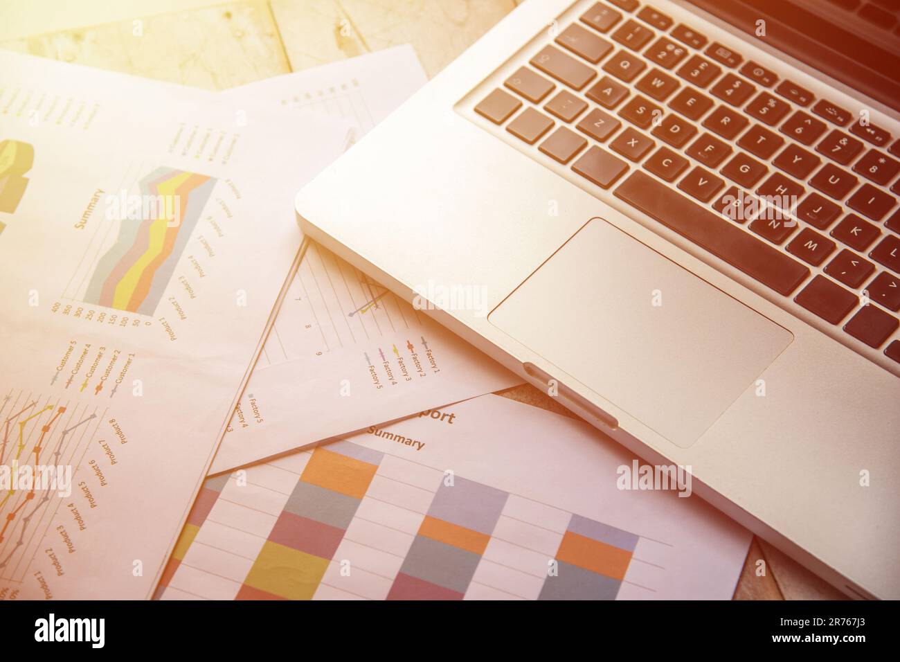 Office desk a stack of paper reports work forms with computer. Modern ...