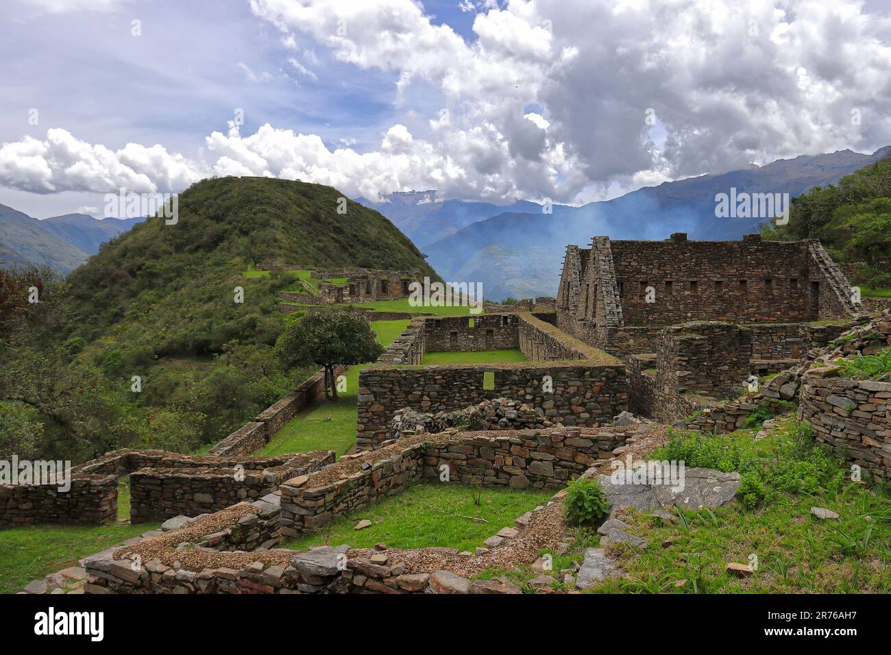 The stunning ancient ruins of the Andes Mountains, surrounded by a lush ...