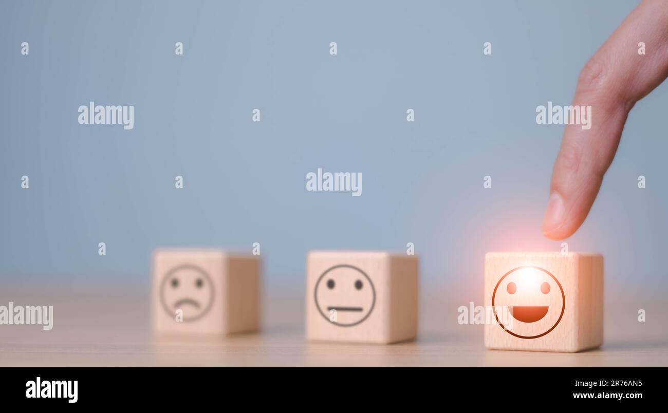 Users choose the highest satisfaction. Businessman's hand selects a ...