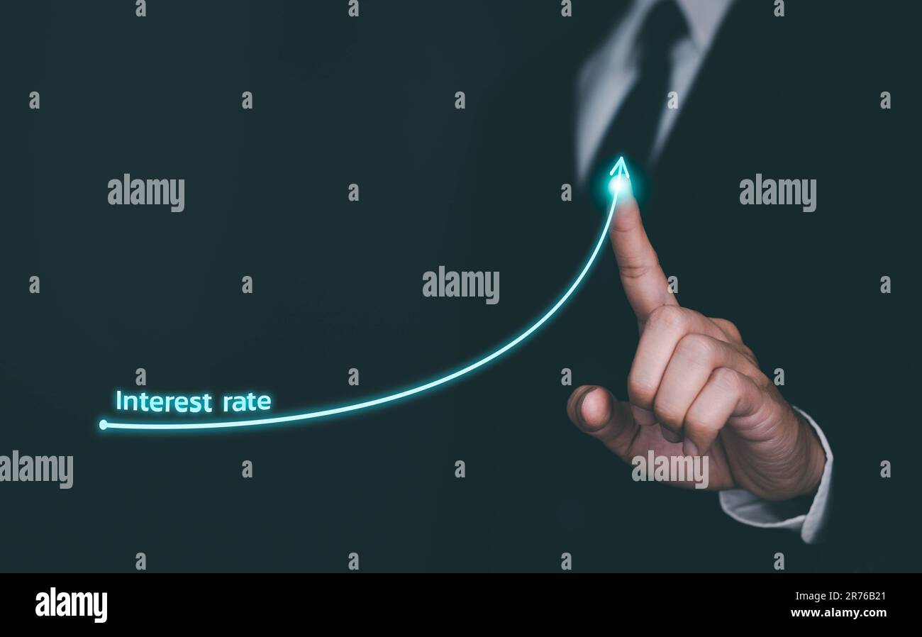 Businessman drawing increasing diagram of interest rate Stock Photo - Alamy