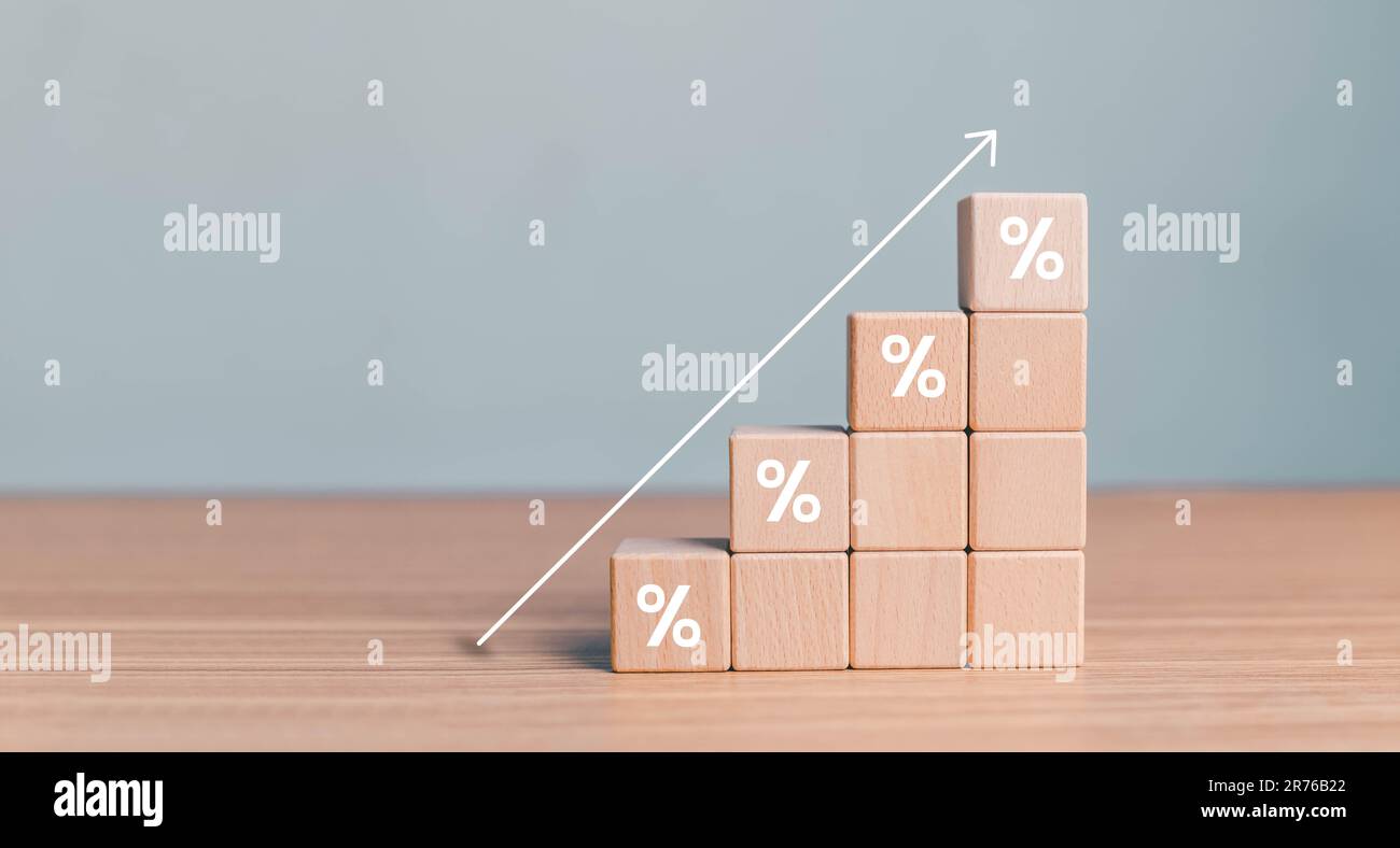 Interest rate financial and mortgage rates concept. Wooden blocks with ...